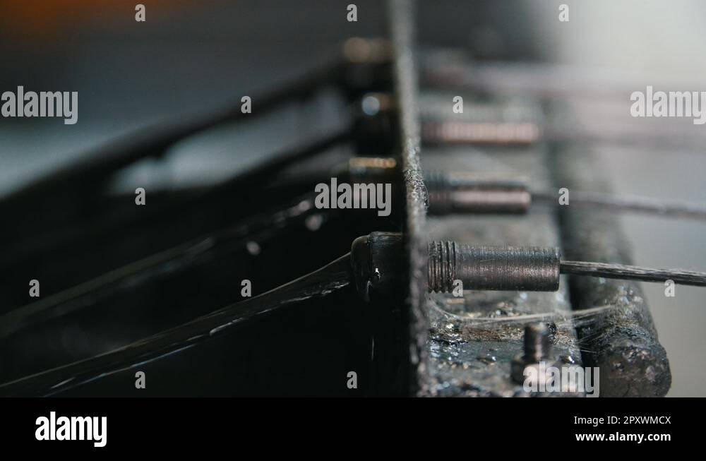 Producing of fiberglass reinforcement - the wire passes through the ...