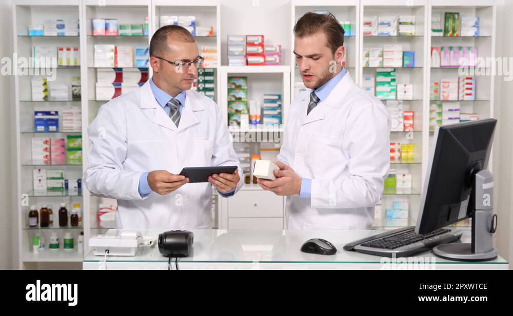 Team of Pharmacists Talking About Drug Medicine Pharmacy Activity Group ...