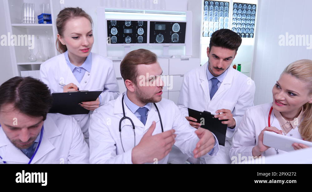 Medical Team of Doctors Talking in Cabinet Desk Positive Teamwork ...