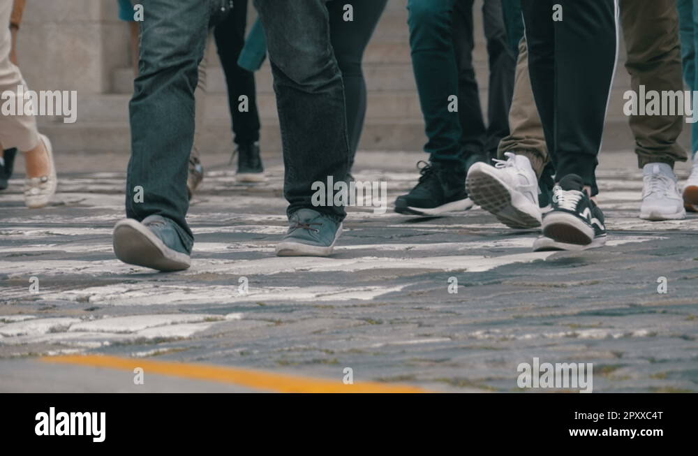 Legs of Crowd People Walking on the Pedestrian Crossing in Slow Motion ...