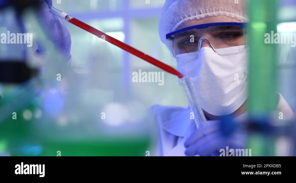Close Up Scientist Man Pour Liquid Sample with Micro Pipette in Tube ...