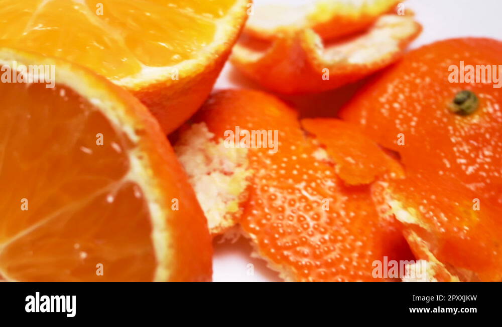 Texture of a cut mandarin orange close-up. Packing grid in the frame ...