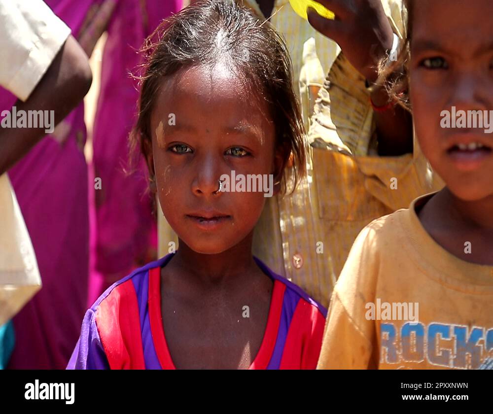 Asian child. Scared poor indian village children Stock Video Footage ...