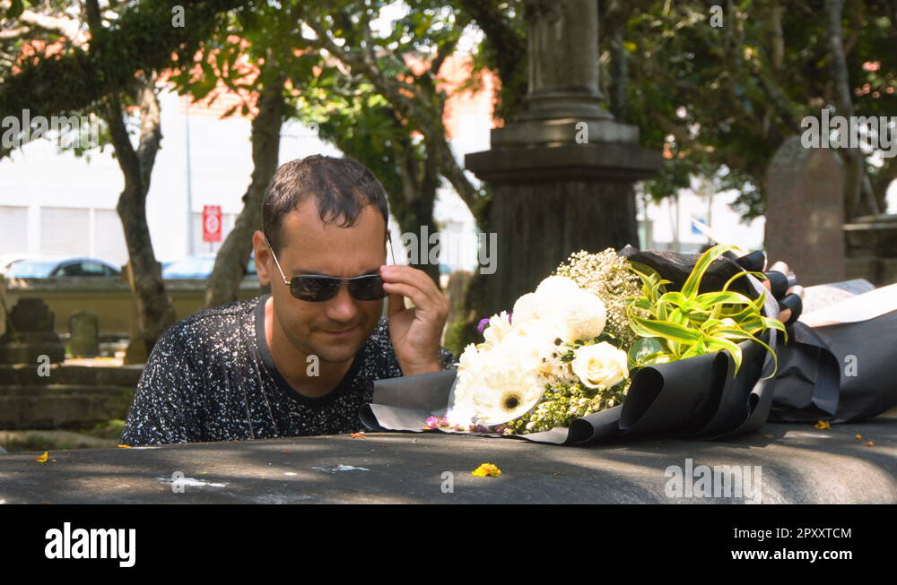 Man grieving funeral Stock Videos & Footage - HD and 4K Video Clips - Alamy