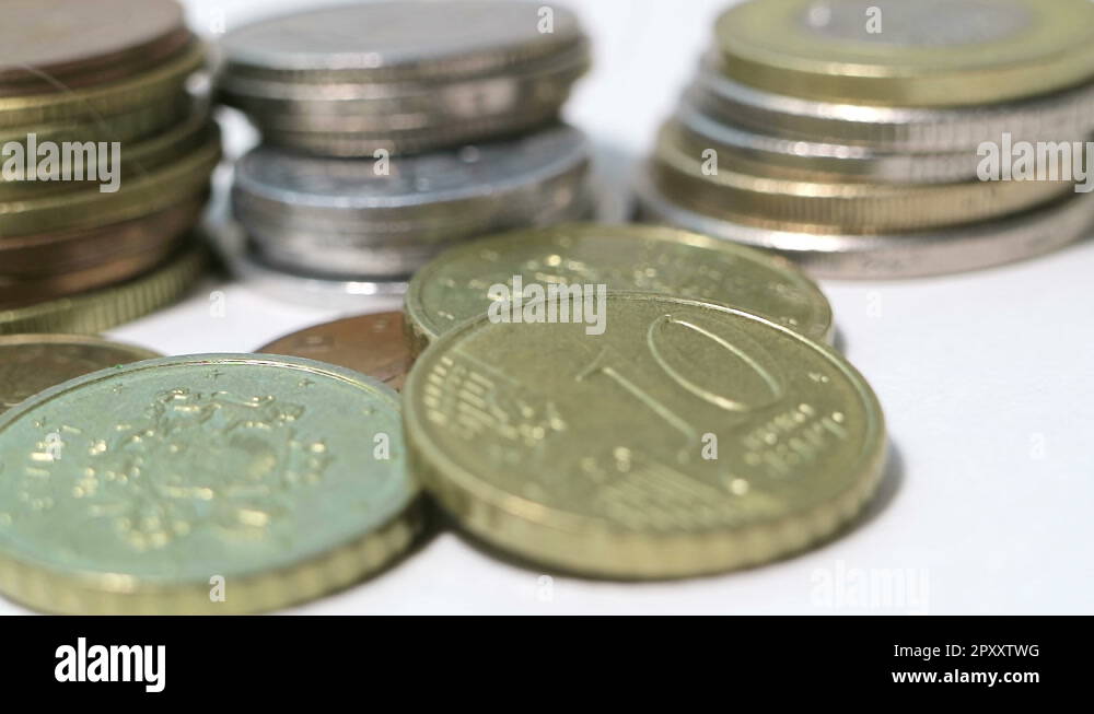 Unusual background from coins of different countries. The coin rotates ...