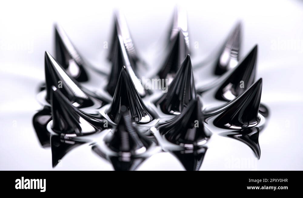 Ferromagnetic fluid creates amazing drawings in a magnetic field Stock ...
