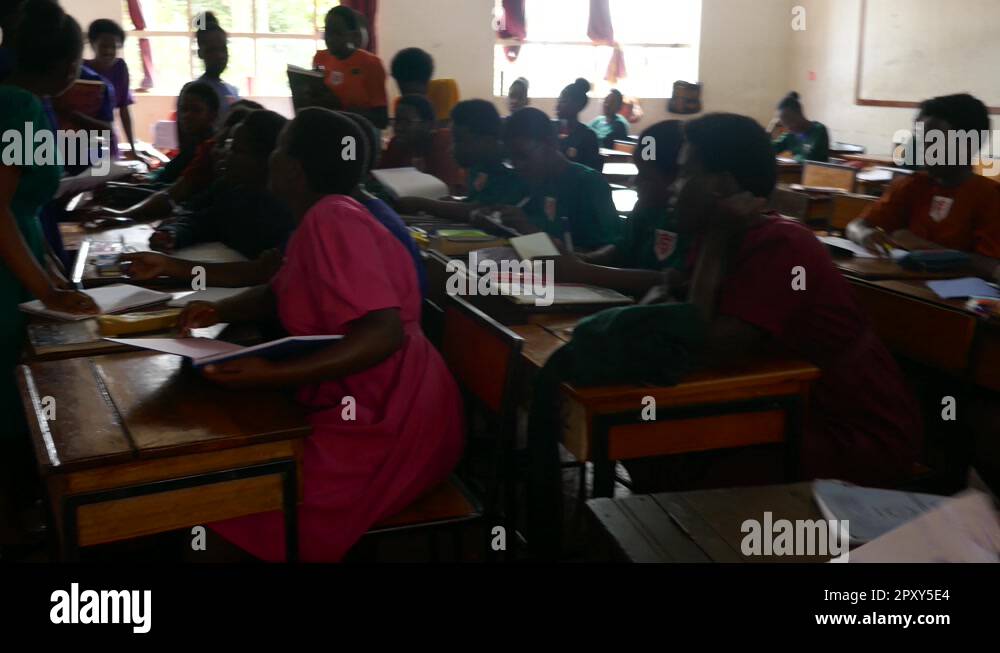 African beautiful black girls are studying, talking during their lesson ...