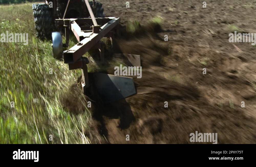 Farmer plowing soil Stock Videos & Footage - HD and 4K Video Clips - Alamy
