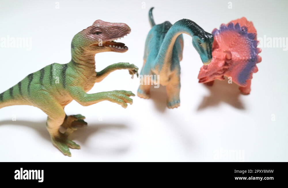 Dinosaurs Of The Jurassic Period Close Up On A Green Background Herbivores Stock Video Footage