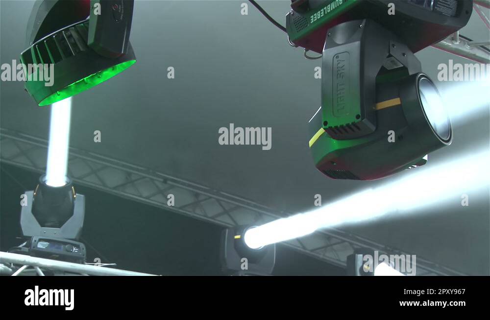 Stage lights at the concert with fog, Stage lights on a console ...