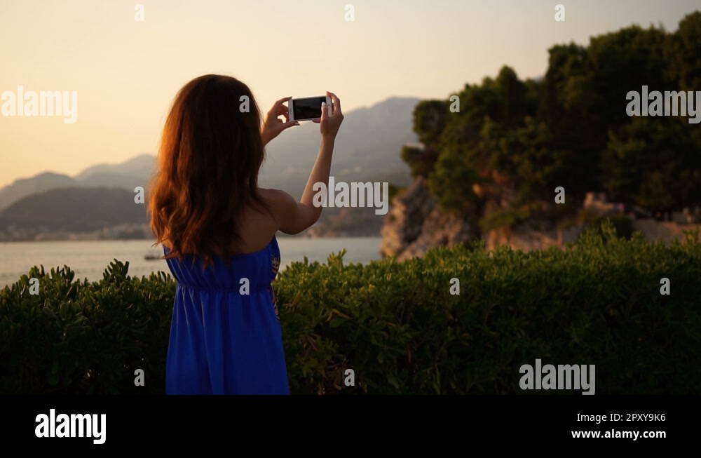 Young woman in dress on beach rear view Stock Videos & Footage - HD and 4K Video Clips - Alamy