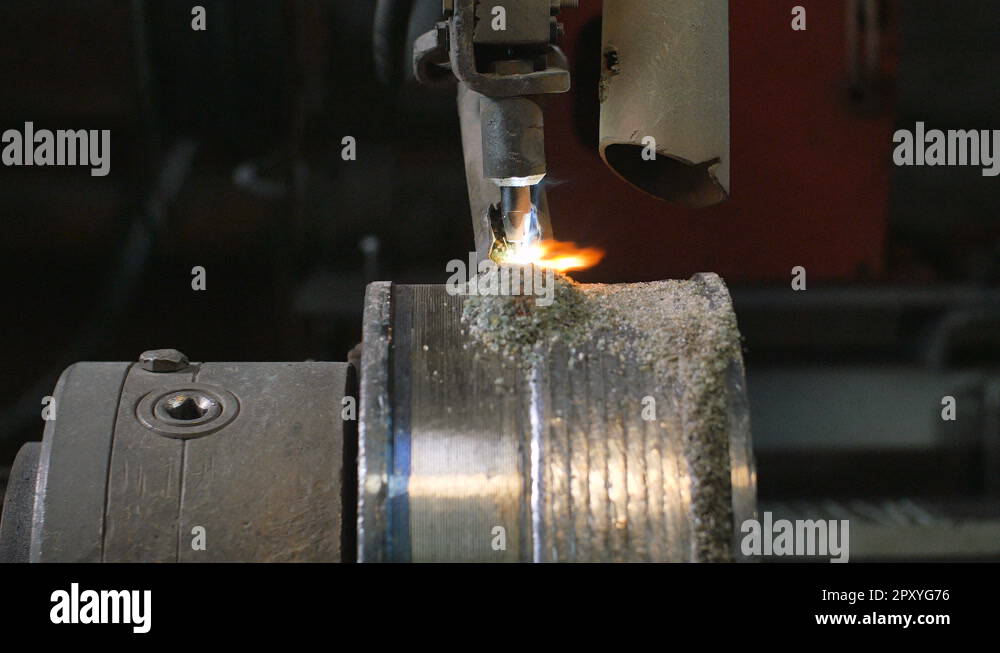 Welding robots apply overlay weld protection on the pipe disks ...
