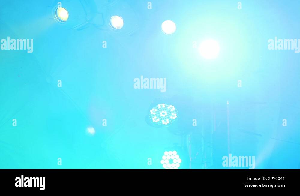 Stage lights at the concert with fog, Stage lights on a console ...