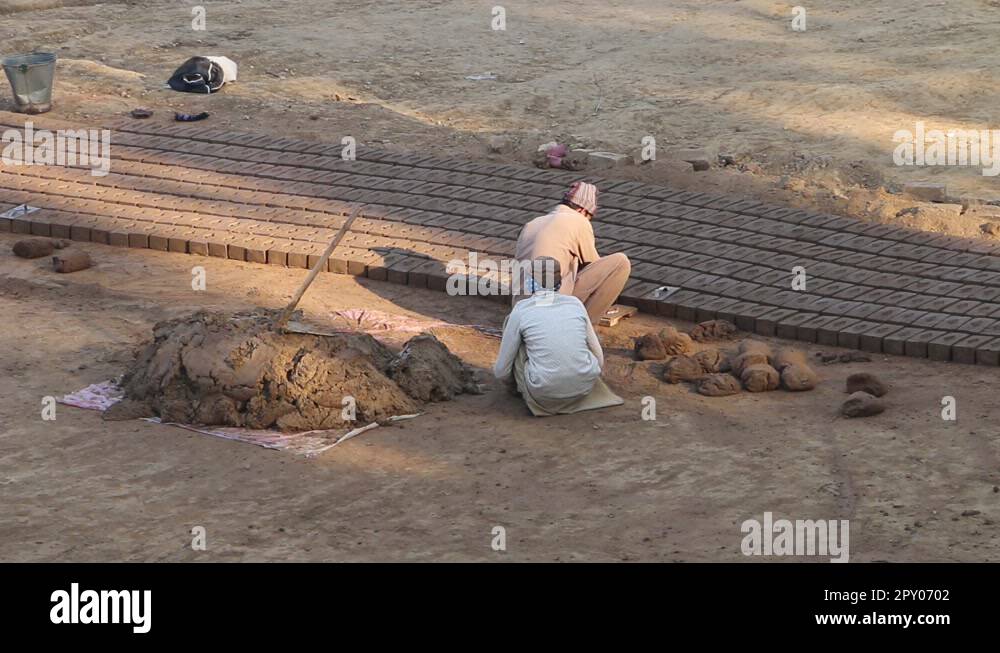 Manual workers making bricks Stock Videos & Footage - HD and 4K Video ...