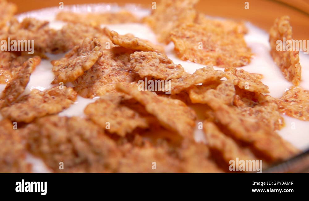 Flakes of cereal falling into a bowl Stock Videos & Footage - HD and 4K ...