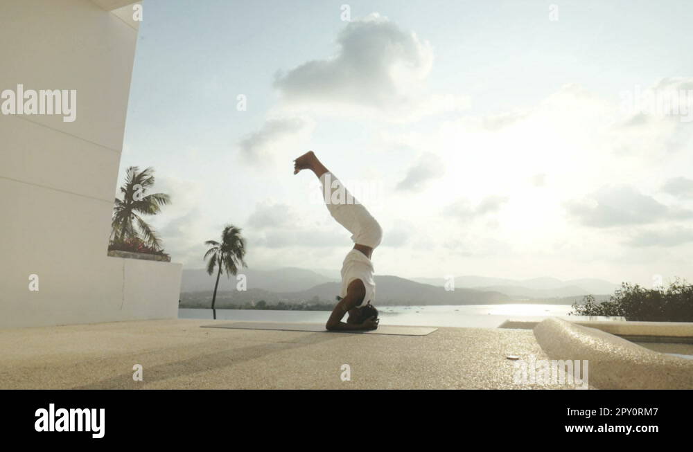 Shirshasana pose Stock Videos & Footage - HD and 4K Video Clips - Alamy