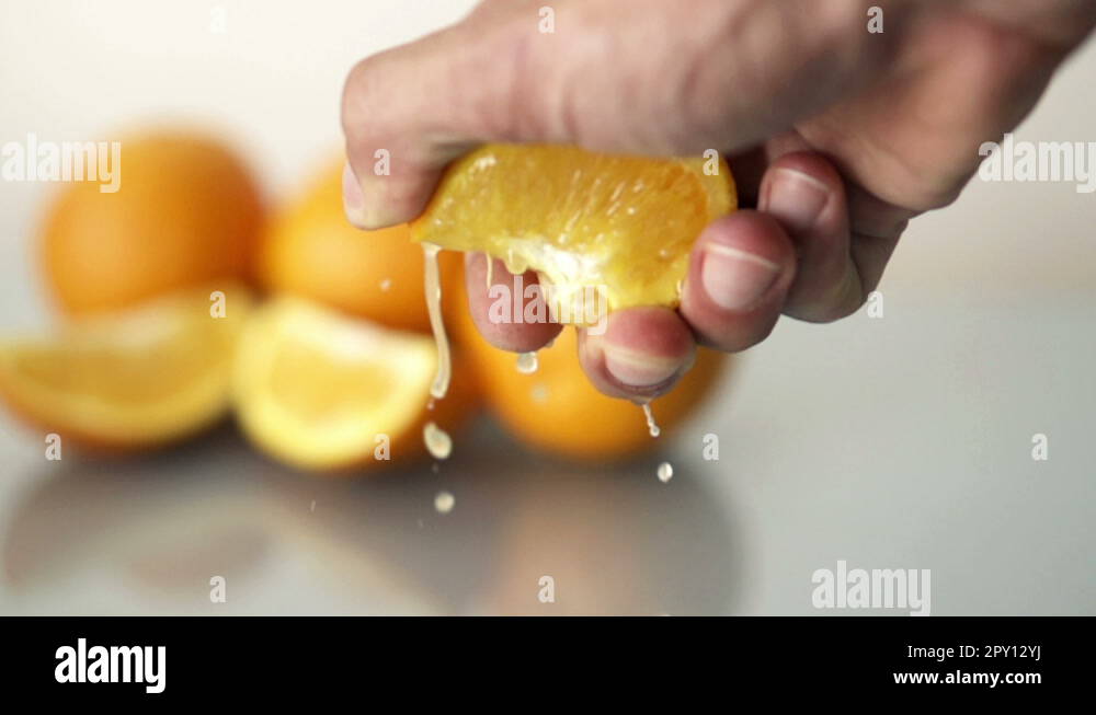 Squeeze orange Stock Videos & Footage - HD and 4K Video Clips - Alamy