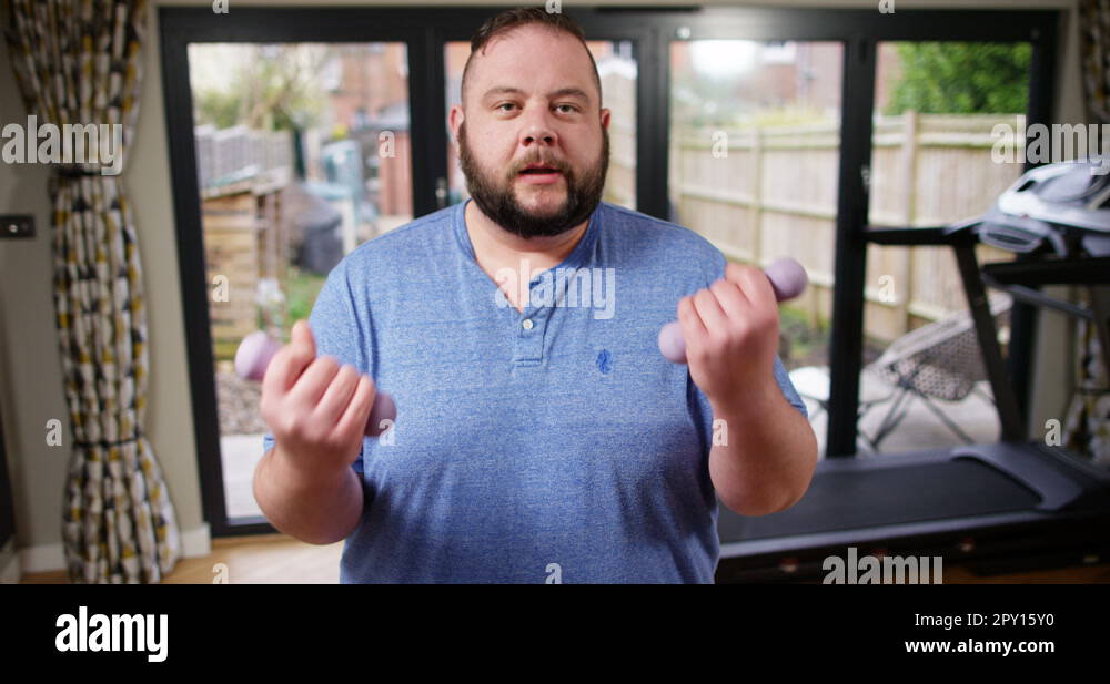 Man small weights Stock Videos & Footage - HD and 4K Video Clips - Alamy