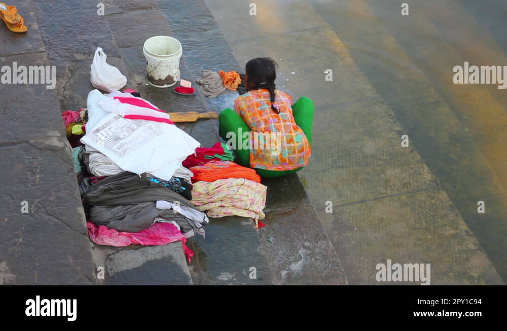 Indian woman washing clothes Stock Videos & Footage - HD and 4K Video ...
