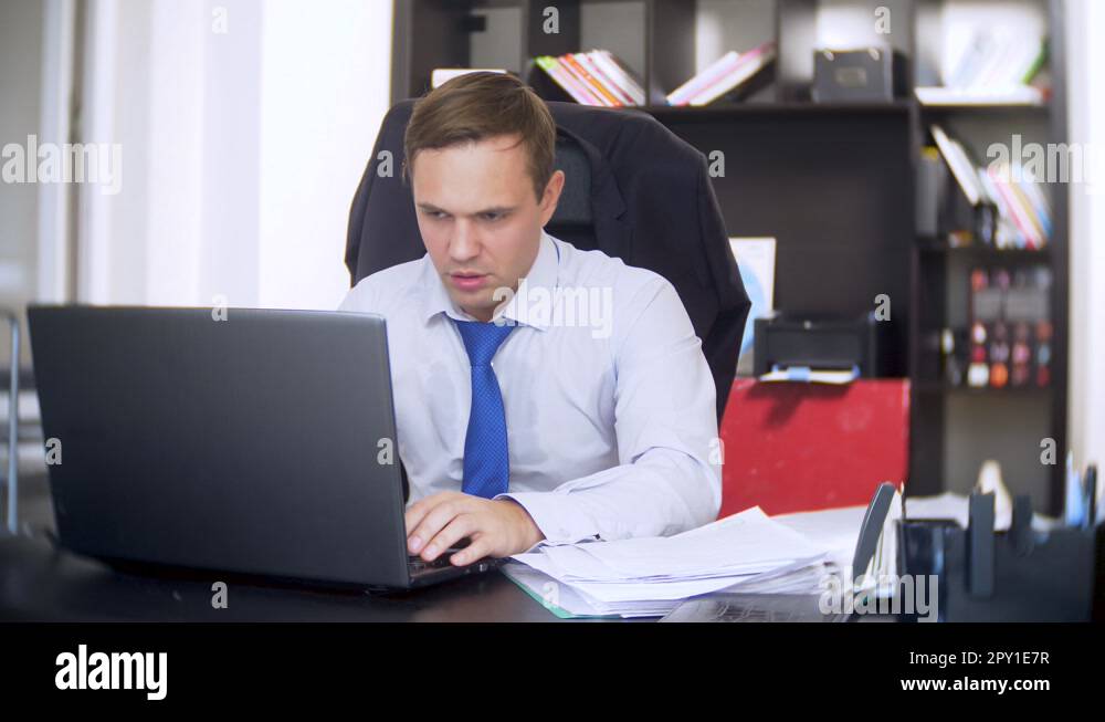 businessman who scans documents, , does not perform an urgent task in ...