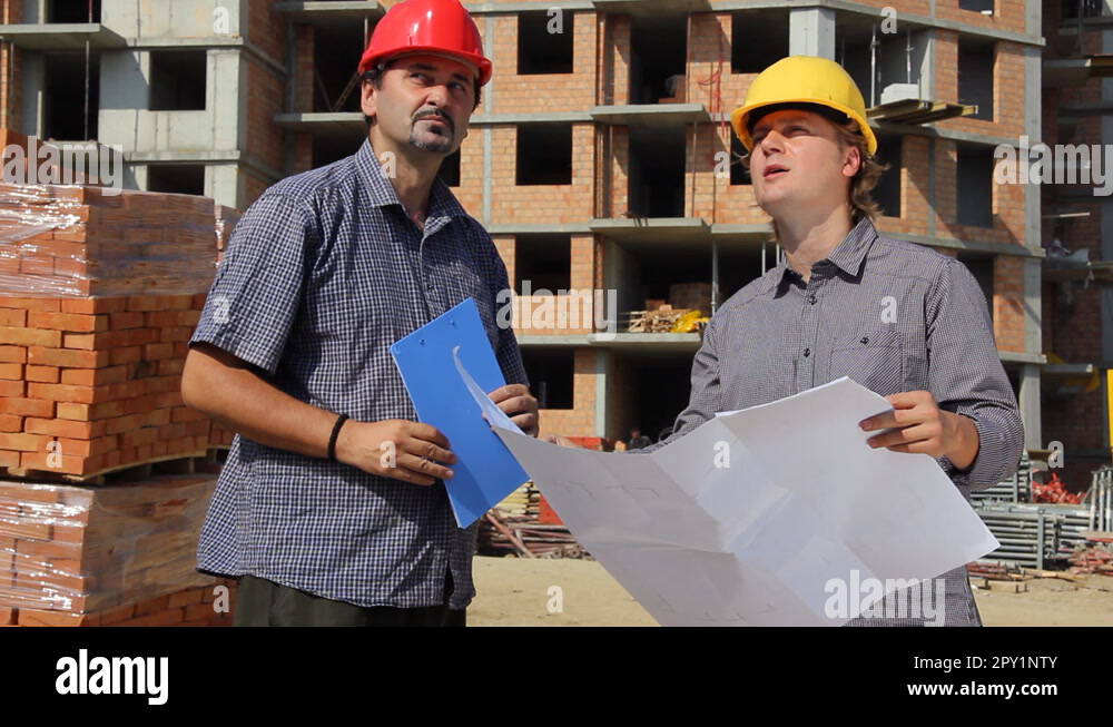Construction workers, teamwork Stock Video Footage - Alamy