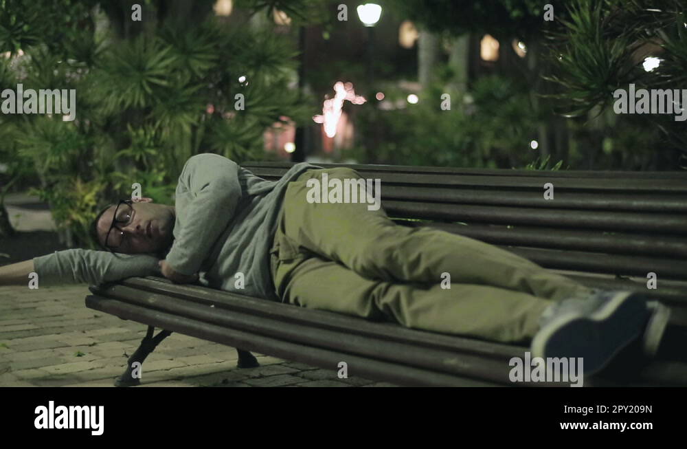 Man sleeping on bench in Stock Videos & Footage - HD and 4K Video Clips ...