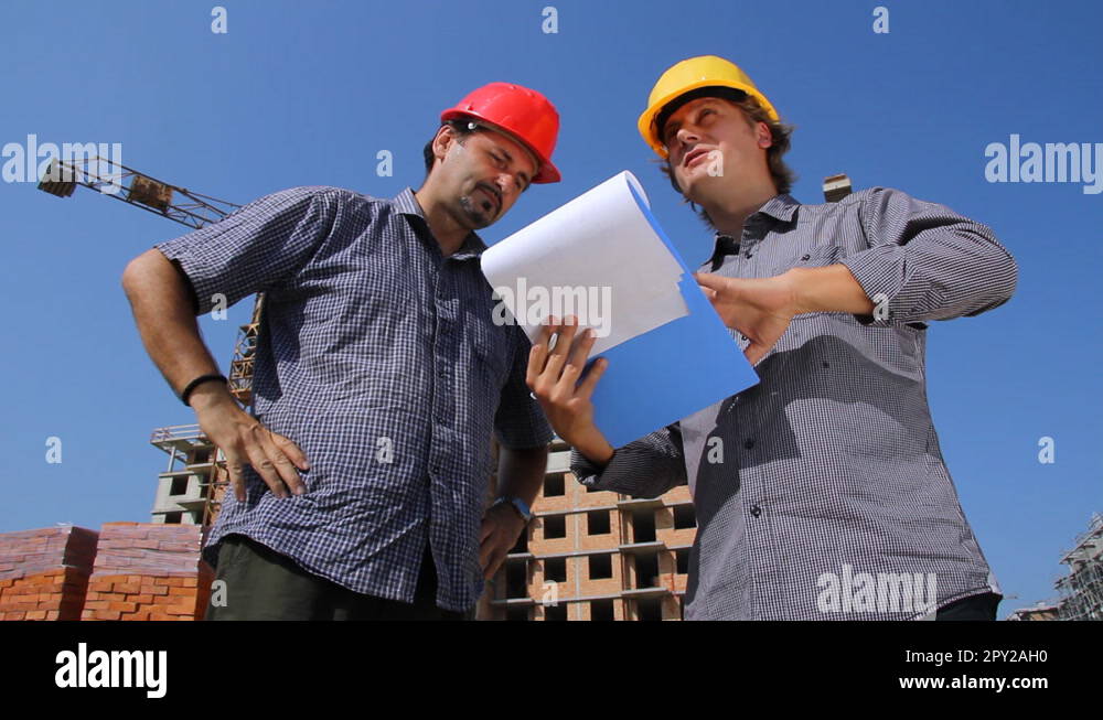 Construction workers, teamwork Stock Video Footage - Alamy
