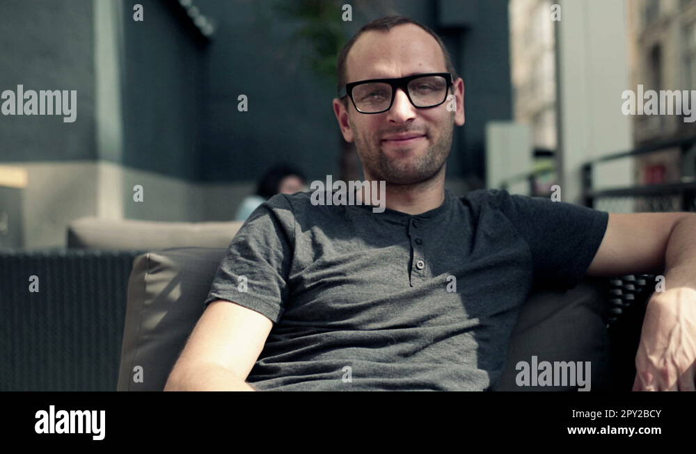 Portrait happy young man sitting Stock Videos & Footage - HD and 4K ...