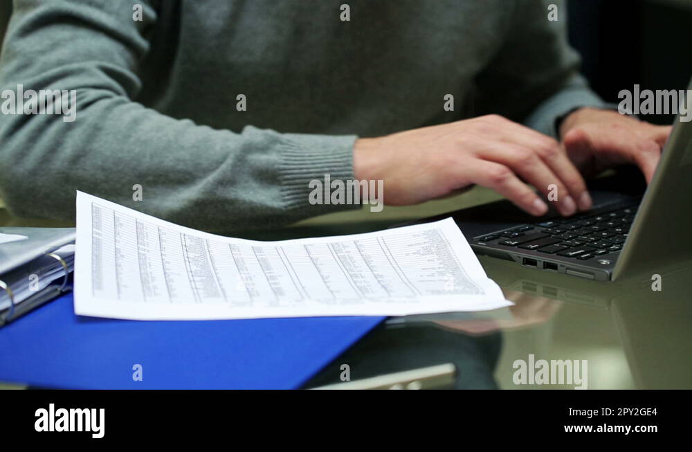 Comparing documents Stock Videos & Footage - HD and 4K Video Clips - Alamy