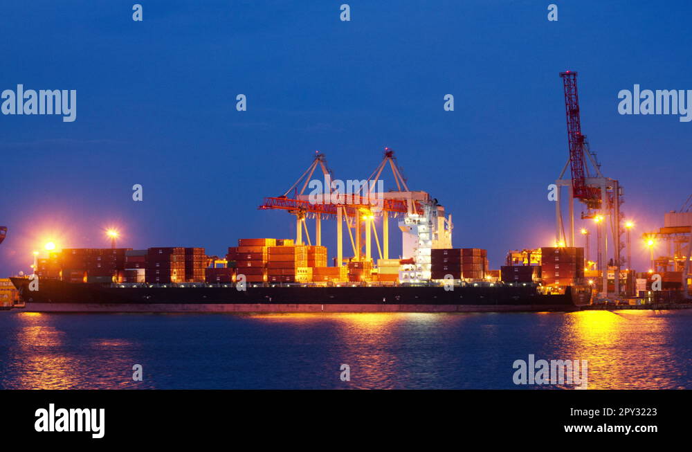 4K. Unloading container cargo freight ship in container terminal Stock ...