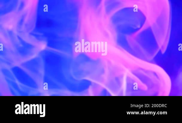 Experience a stunning journey through blue and purple smoke on a dark ...