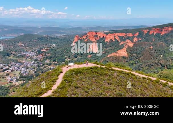 Observation ground on the top of the high mountain. Tourists stand ...