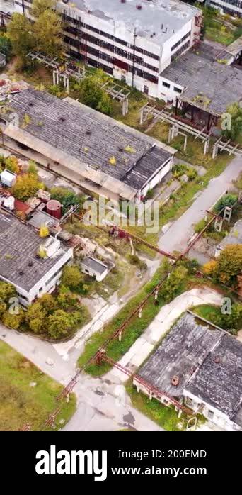 Old industrial area. Abandoned buildings with old roofs. Destructive ...