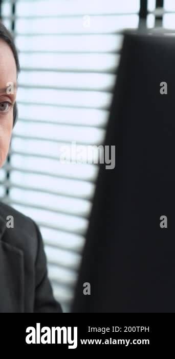 Competent african american female operator working on computer and ...