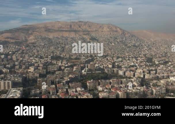 Aerial view of Damascus. Syrians celebrating the fall of Bashar al ...