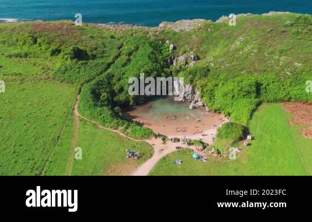 Gulpiyuri beach in Asturias, northern Spain. Aerial view of the unique ...