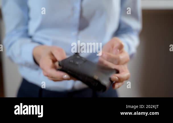 Woman opens black wallet with money. Close shot. High quality 4k ...