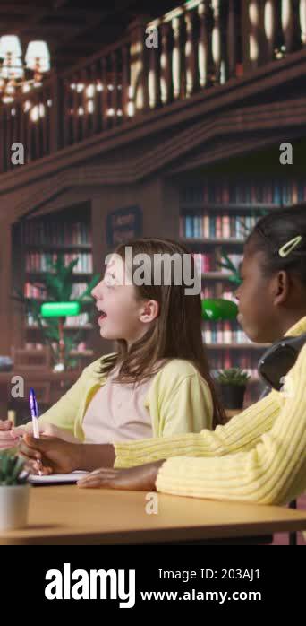 Vertical Video African american private teacher offering support to her students, tutoring them ...