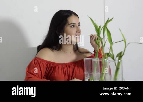 Latina woman explaining and testifying, talking about her hair while ...