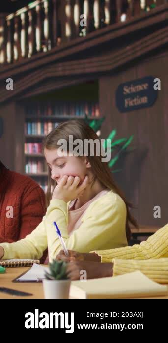 Vertical Video African american professor mentoring diverse students in ...