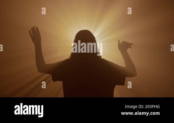 Hand gestures and signs. Woman silhouette dancing sensitively with ...
