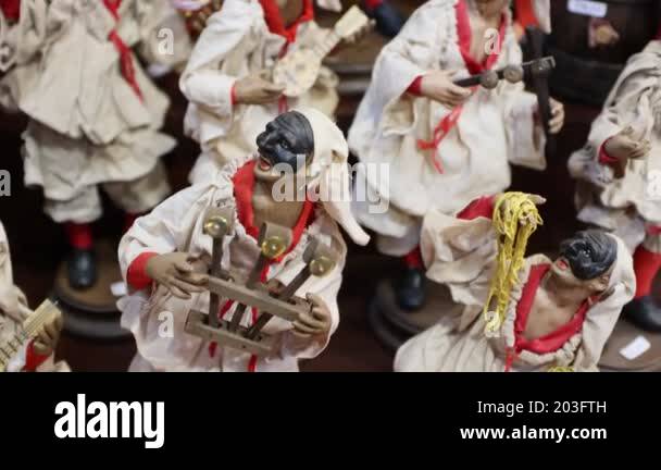 Naples, Italy - December 12, 2024: Handcrafted figurines depicting the ...