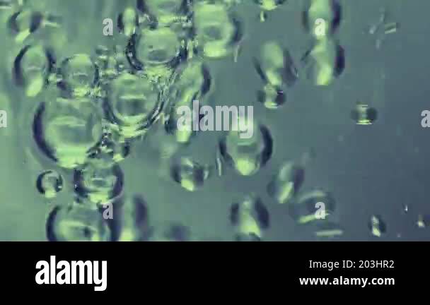 Abstract liquid background. Chaotic bubbles movement in water reflected ...