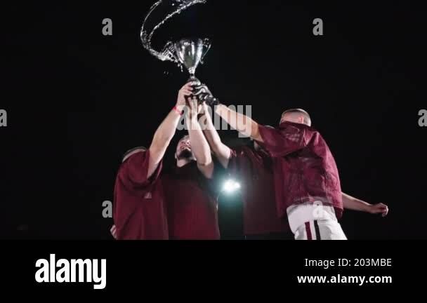 American Football Team in White Uniform in the Middle of the Field ...
