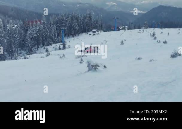 Snow removal machine in snowy mountains Stock Video Footage - Alamy