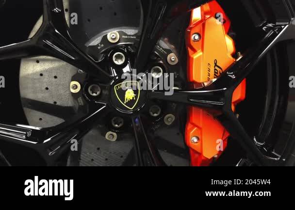 Detailed view of Lamborghini Revuelto's black alloy wheel, featuring ...