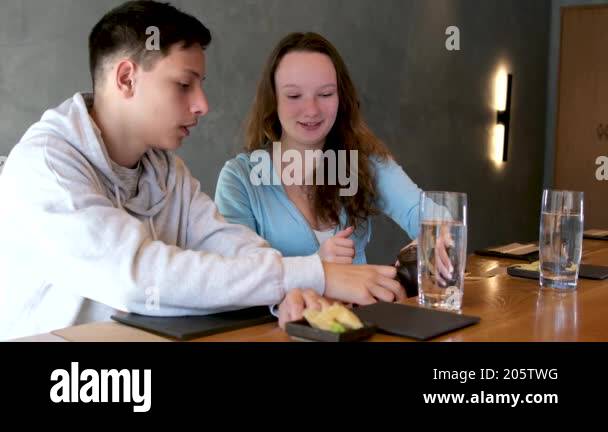 Smiling indian businesswoman hr team member executive talking to male ...