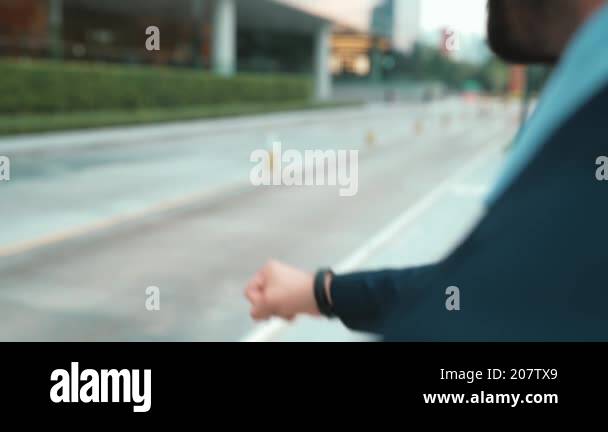 Closeup of professional businessman hand show smart watch and pointing ...