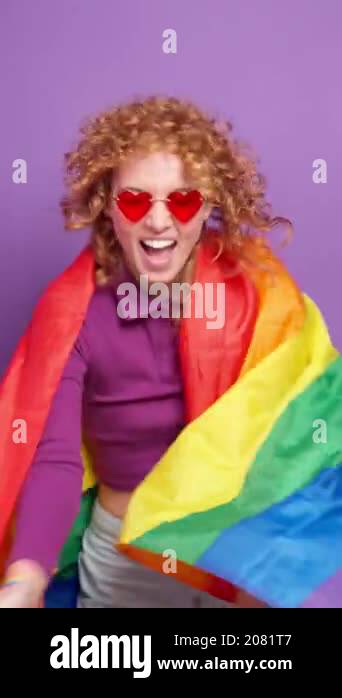 Slow motion montage of a young lgbtq activist expressing joy and ...