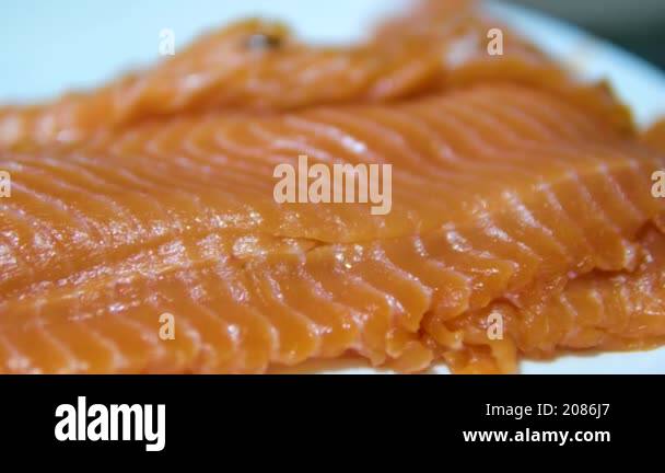 Sliced salted fresh salmon or smoked salmon fish fillet, stock video 4k ...